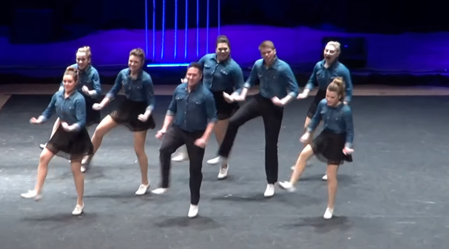 8 dancers turn their back to the audience – when they turn around ...