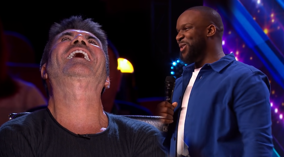 Simon Cowell Gives comedian Axel Blake with a gold buzzer at BGT 2022 ...